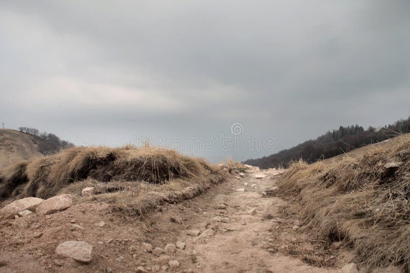 Sandy Path with Stones and a Cloudy Sky Stock Image - Image of land ...