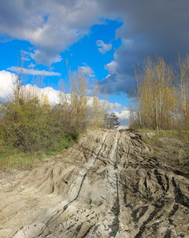 Sandy road against the sky stock photo. Image of grass - 28178440