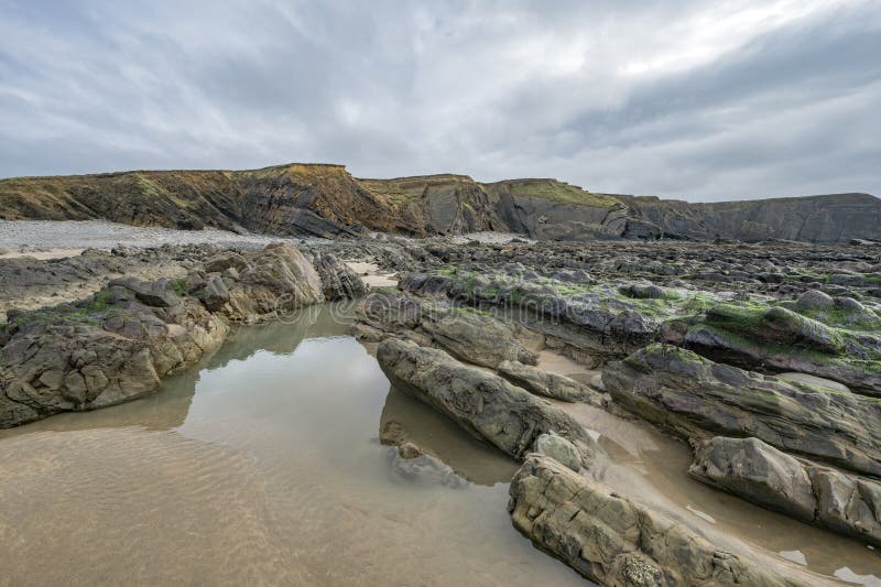 Sandy Rockpools on Northcott Mouth Beach Stock Photo - Image of ...