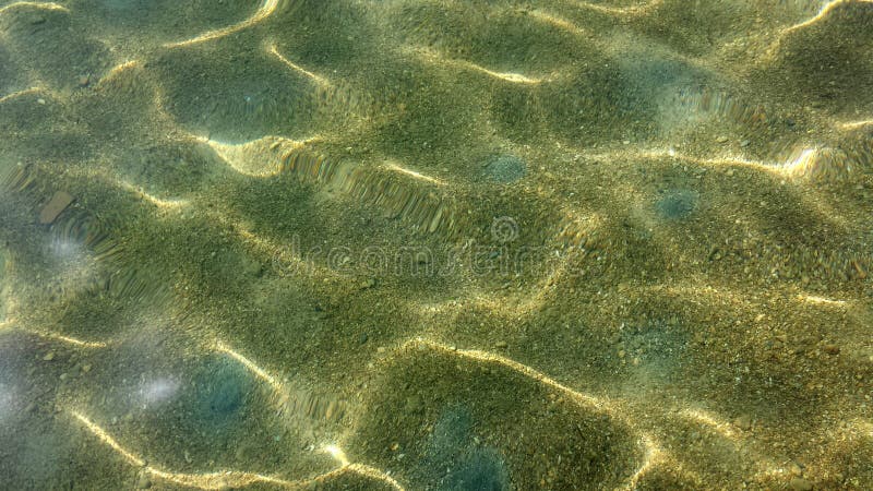 Sandy and rocky seabed stock photo. Image of reflections - 59287966