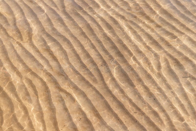Sandy Seabed Pattern Under Shallow Water Stock Photo - Image of motion ...