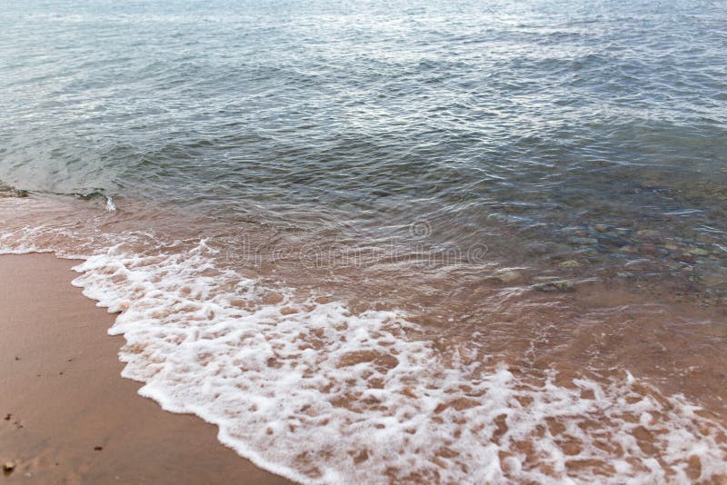 Sandy Shore of the Sea As a Backdrop Stock Image - Image of wave, beach ...