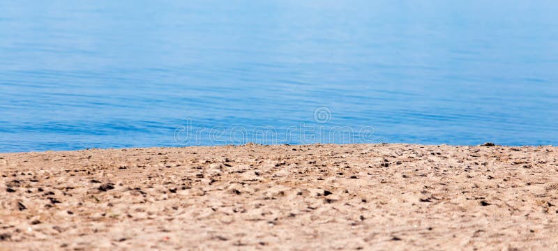 Sandy Shore of the Sea As a Backdrop Stock Image - Image of beautiful ...
