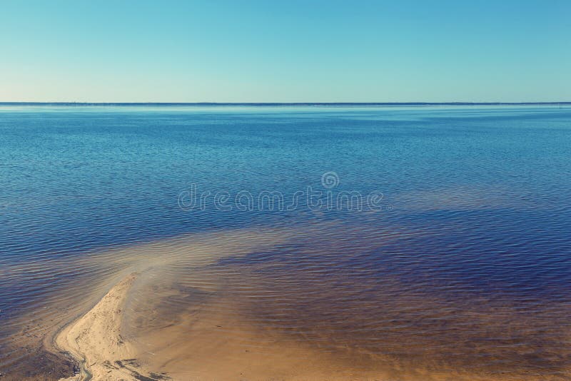 Shoreline with a sandy stock photo. Image of puglia - 120852798