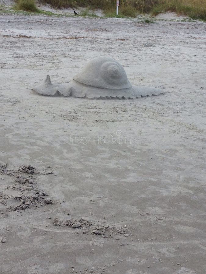 Sandy the Snail stock photo. Image of sand, castles, sandy - 55958272