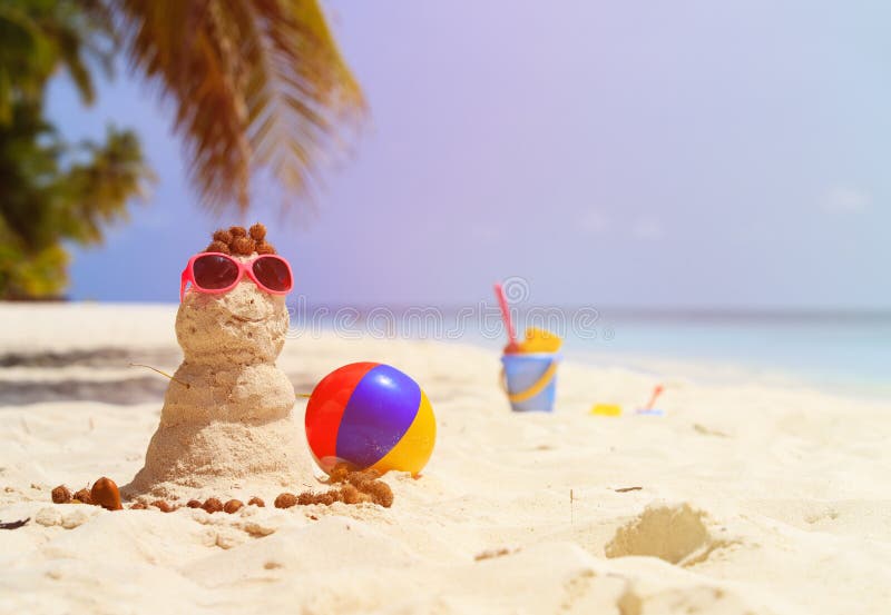Sandy Snowman and Toys at Sand Beach Stock Image - Image of funny ...