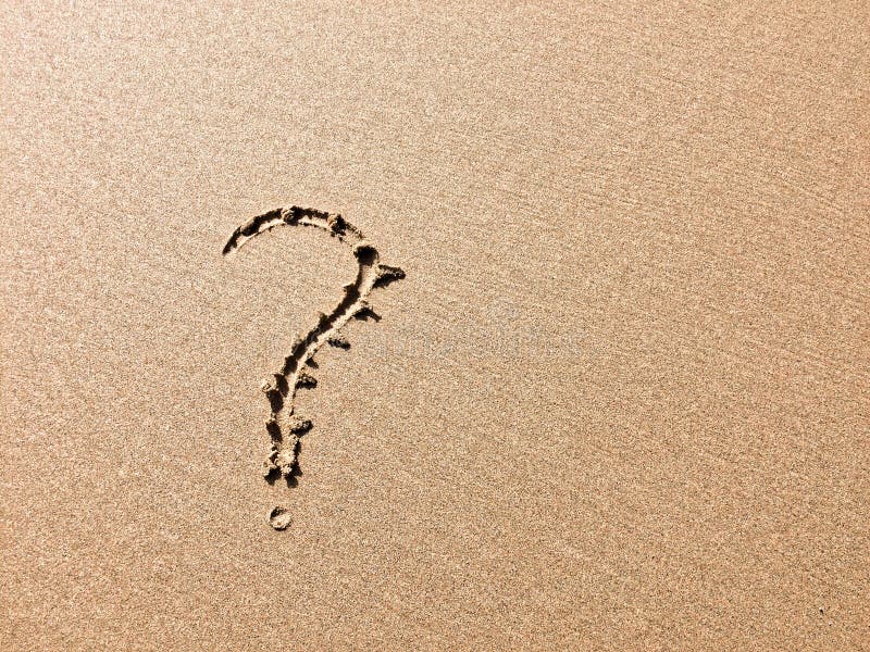 A Sandy Surface Bears a Clear Question Mark, Indicating a Query or ...