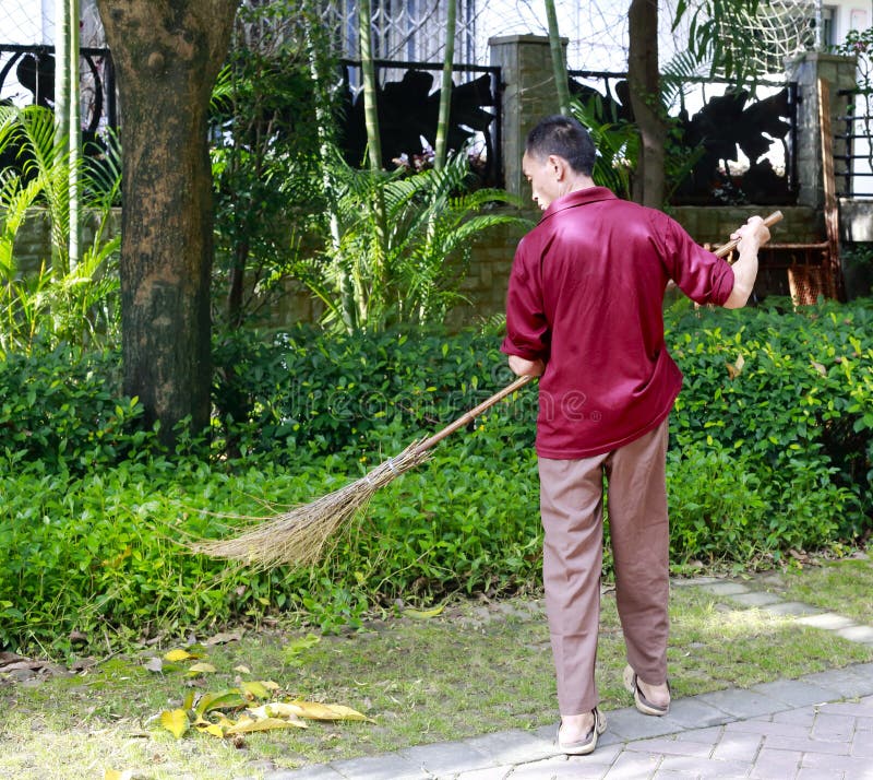 Sanitation worker sweep editorial stock image. Image of city - 44666519
