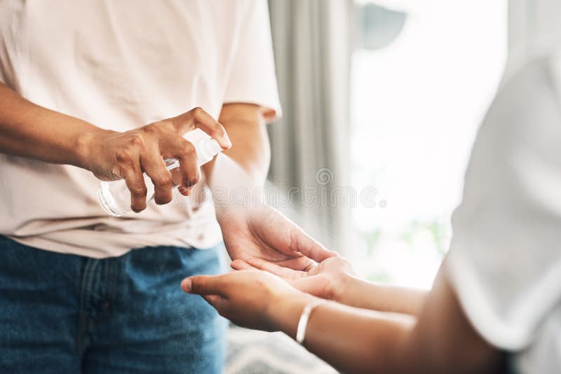 Sanitising Keeps Us Both Safe. Two Unrecognizable People Using Hand ...