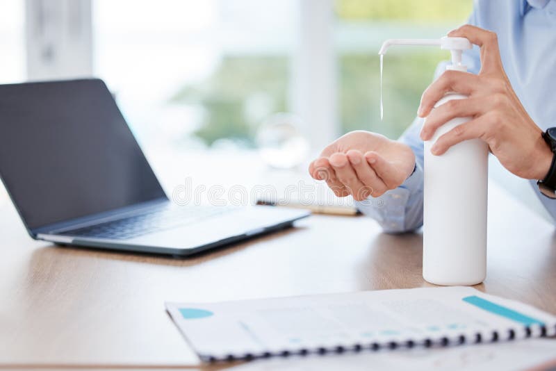 Sanitising and Staying Safe. an Unrecognizable Businessperson ...