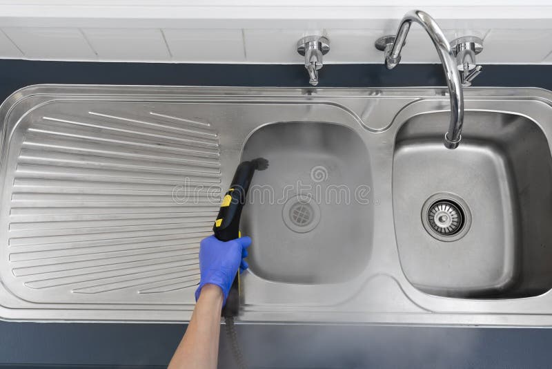 Sanitizing Kitchen Sink with Steam Cleaner Stock Photo - Image of ...