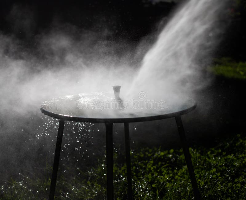 Sanitizing a Table Outdoors Contre Jour Stock Photo - Image of ...