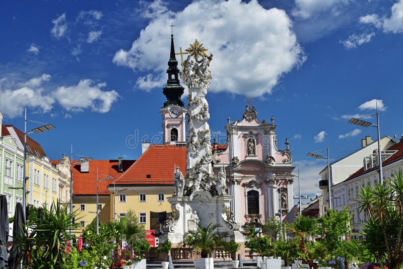 Franciscan Church and Holy Trinity Statue in St Polten, Austria Stock ... Franciscan Church and Holy Trinity Statue in St Polten, Austria Stock ...