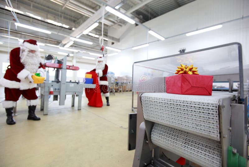 Gifts on Conveyor Belt in Christmas Presents Facto Stock Photo - Image ...