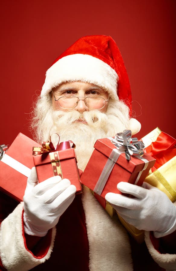 Santa carrying gifts stock photo. Image of december, season - 59759566