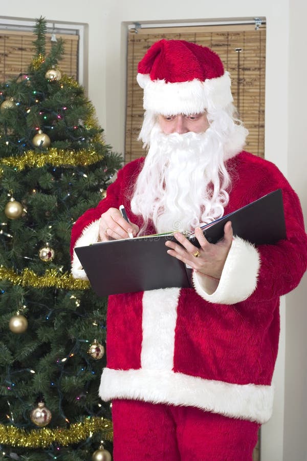 Santa Checking the List stock photo. Image of place, holidays - 7590120