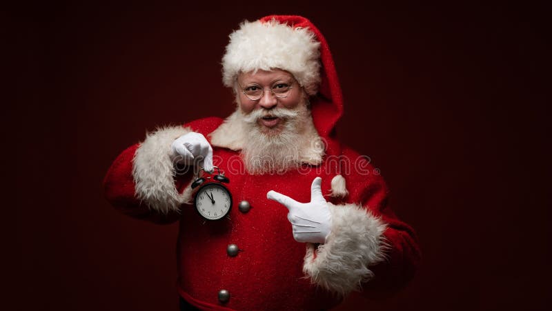 Santa Claus with Alarm Clock Stock Photo - Image of december, pointing ...
