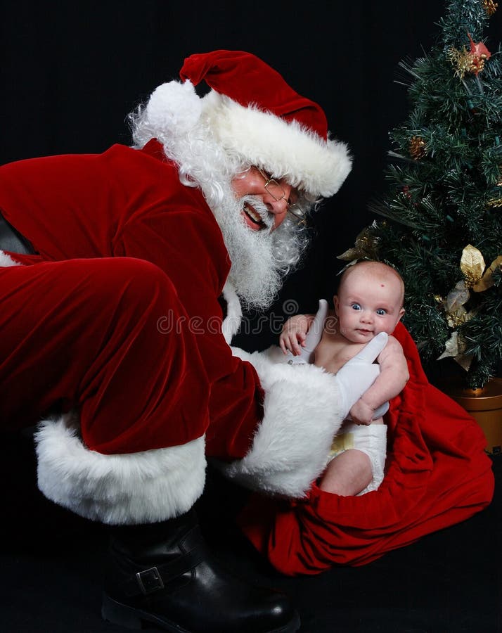Santa Claus and Baby stock image. Image of baby, present - 16527423