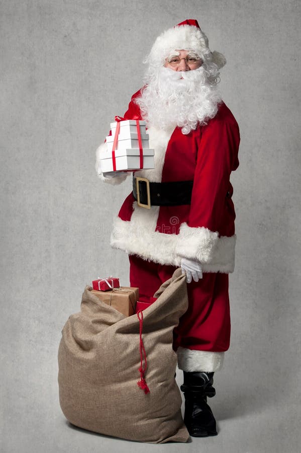 Santa Claus with a Bag of Presents Stock Photo - Image of present ...