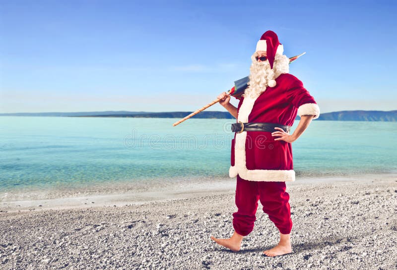 Santa Claus on the Beach stock image. Image of season - 27777293