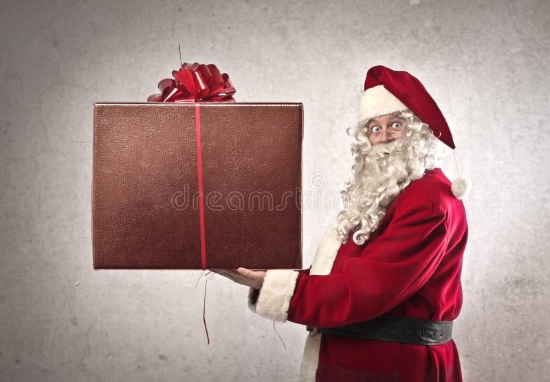 Santa Claus with Big Christmas Present Stock Image - Image of costume ...