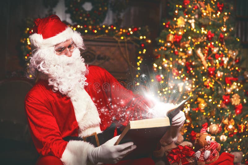 Santa Claus at Christmas with Magical Book Stock Image - Image of ...