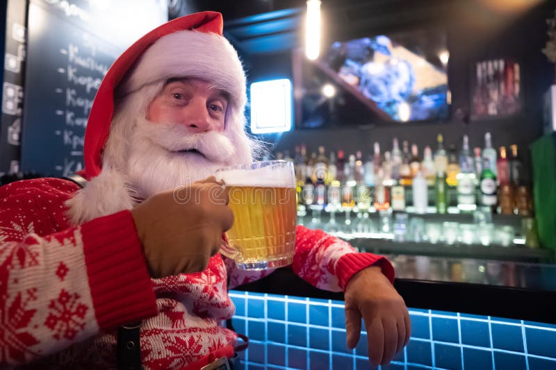 Santa Claus Drinking Beer at a Bar. Stock Photo - Image of full, bubble ...