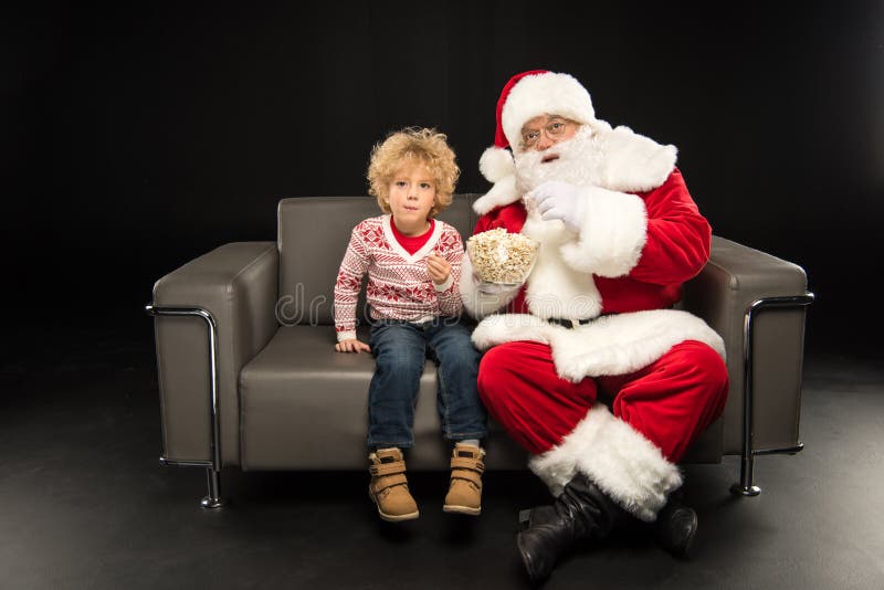 Santa Claus Eating Popcorn with Child Stock Image - Image of people ...