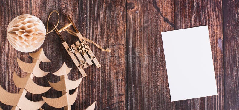 Santa Claus Gift Sheet and Cardboard Handmade Decorations on the Table ...