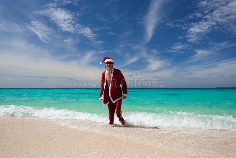 Santa Claus on Beach Relaxing Stock Photo - Image of tropical, relax ...
