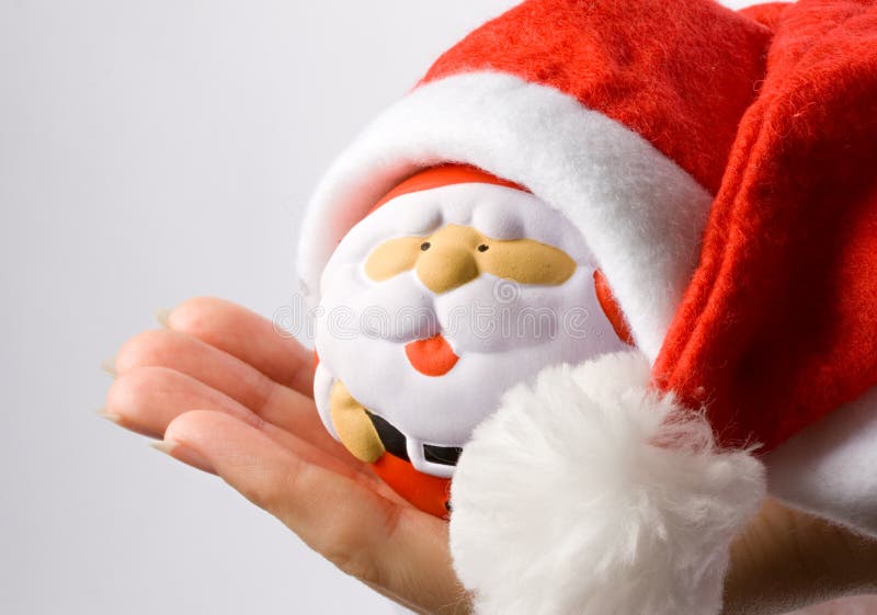 Santa Claus in the hand stock photo. Image of face, december - 21479880