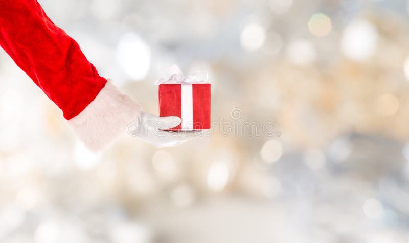 Santa Claus Hand Holding Out Gift Box. Stock Image - Image of human ...