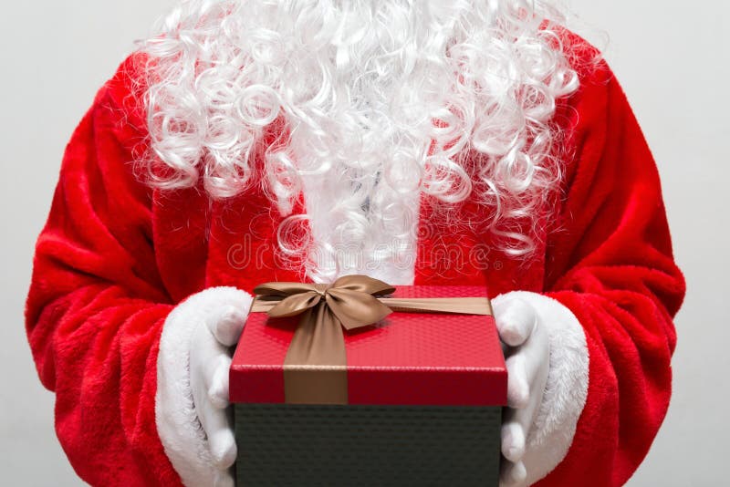 Santa Claus Handing Gift Box Stock Photo - Image of newyear, claus ...