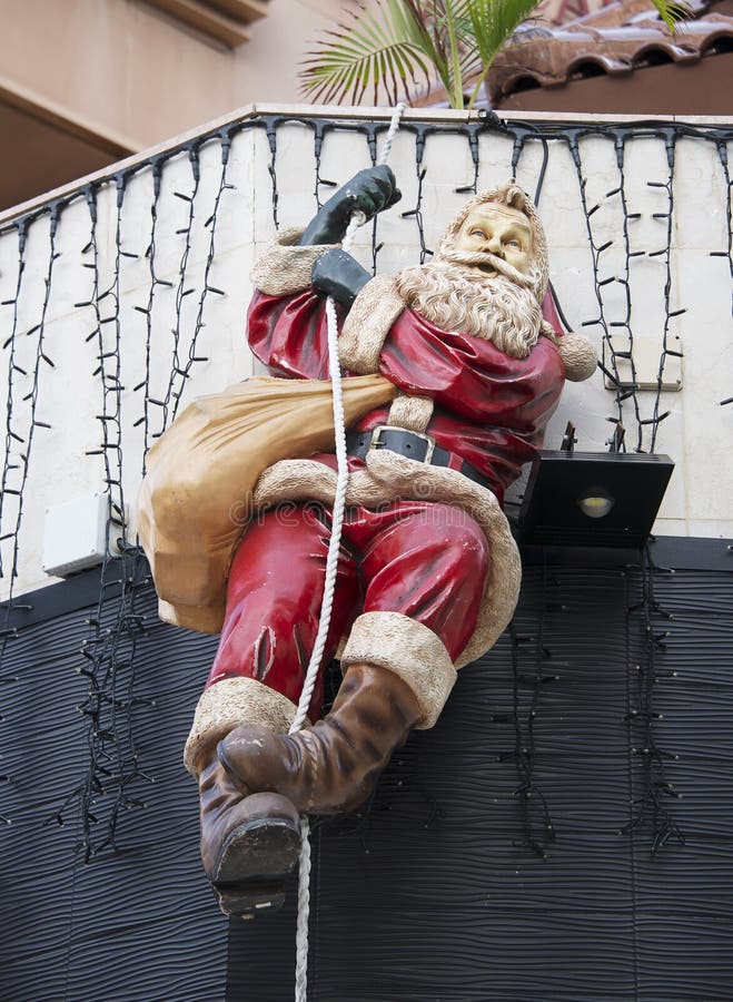 Santa Claus Hanging on a Rope Stock Image - Image of swing, winter ...