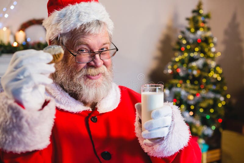 Santa Claus Having a Cookie with Milk Stock Image - Image of apartment ...