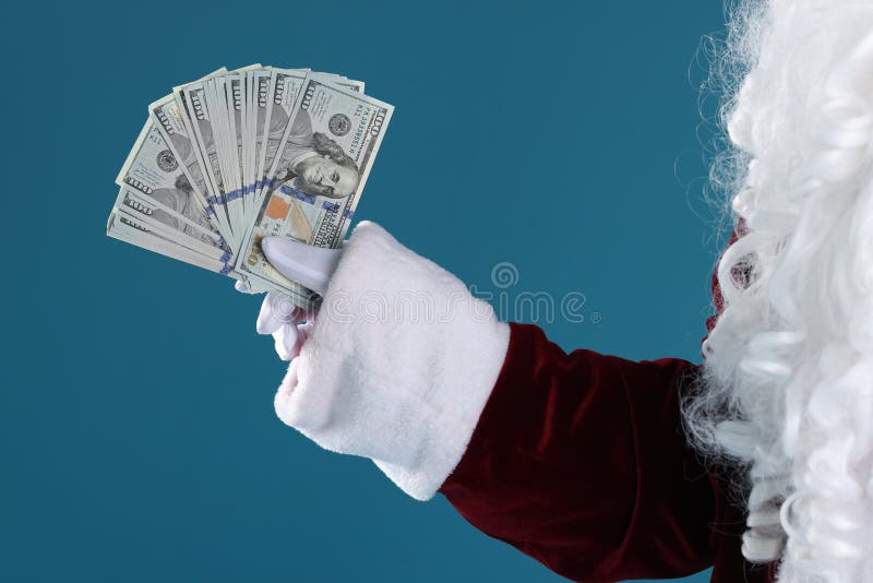 Santa Claus Holding Dollar Banknotes on Blue Background, Closeup Stock ...
