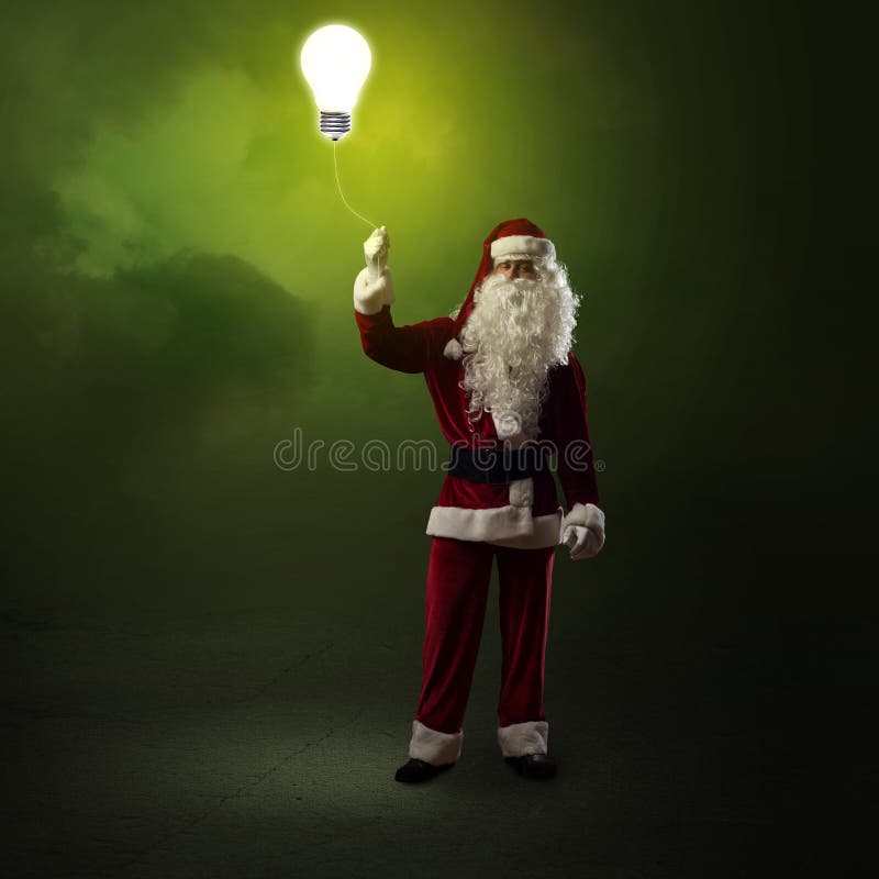 Santa Claus is Holding a Shining Lamp Stock Image - Image of santaclaus ...