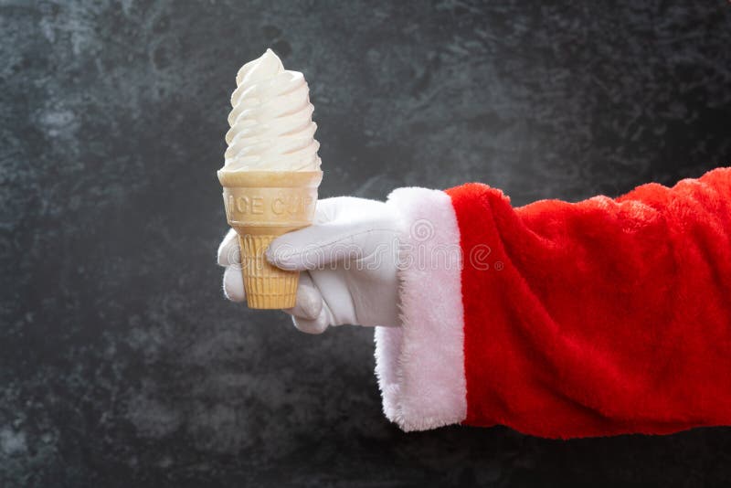 A Santa Claus Holds an Ice Cream Cone Stock Photo - Image of cheerful ...