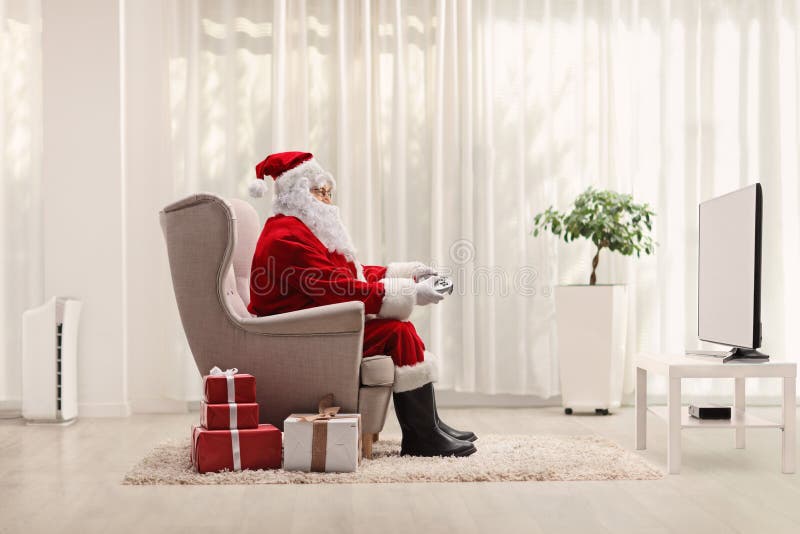 Santa Claus with a Joystick Playing Video Games Stock Photo - Image of ...