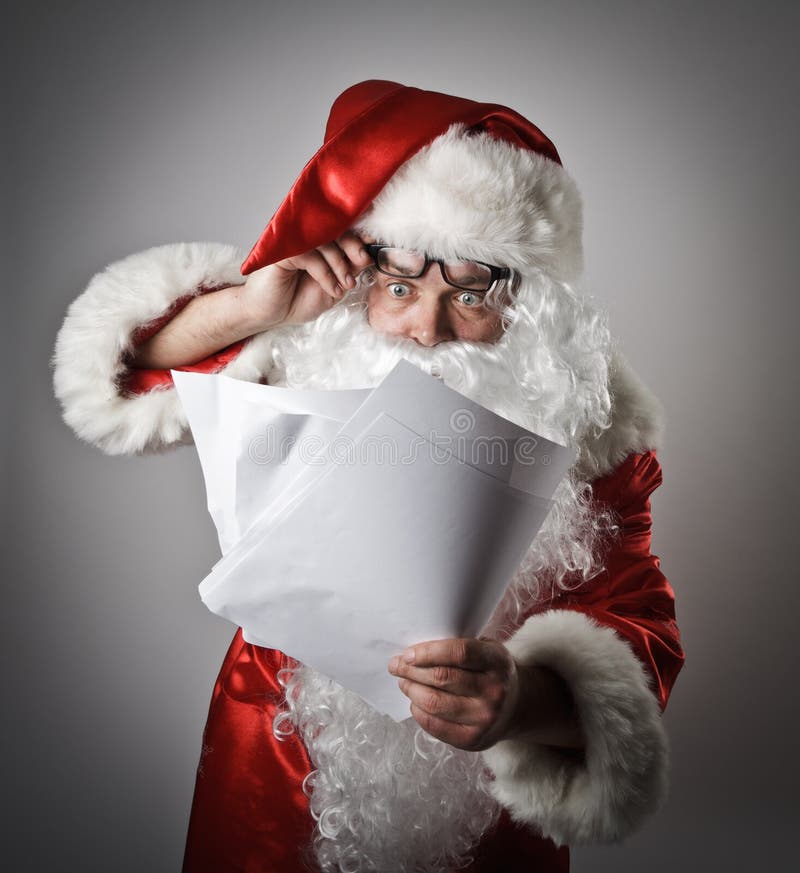 Santa Claus and letters stock photo. Image of holds, holding - 64888048