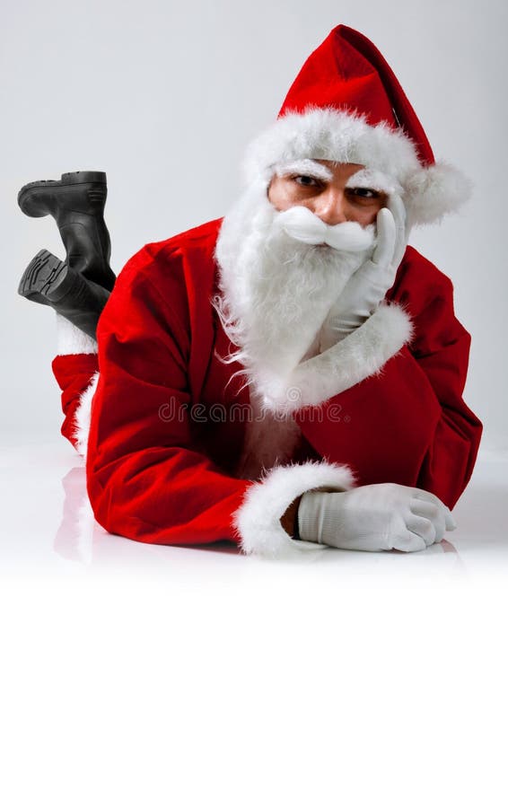 Santa Claus Lying Down with Serious Expression Stock Photo - Image of ...