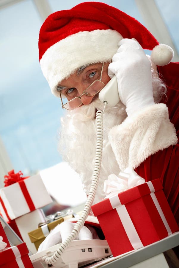 Santa Claus calling stock photo. Image of december, gloved - 16602076