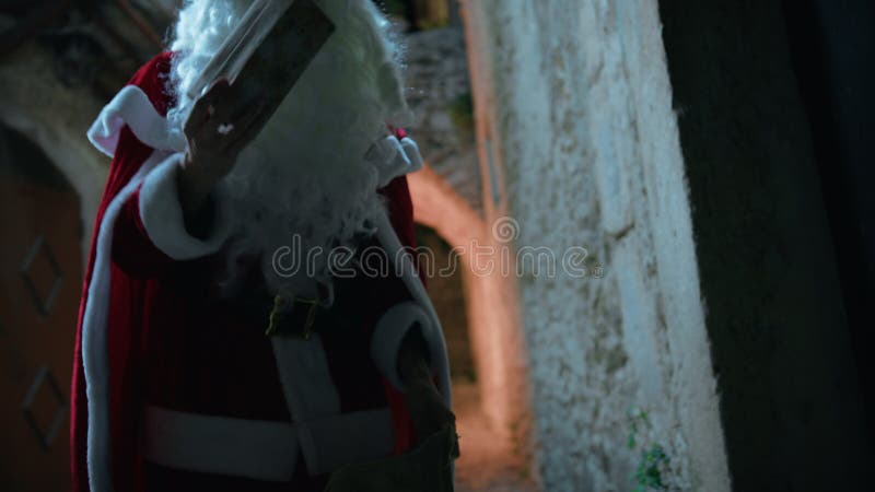 Santa Claus Picking Presents from His Bag in the Night Stock Footage ...