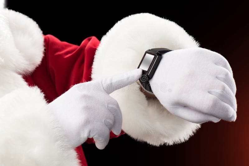 Santa Claus Pointing on Smart-watch Stock Image - Image of santa ...