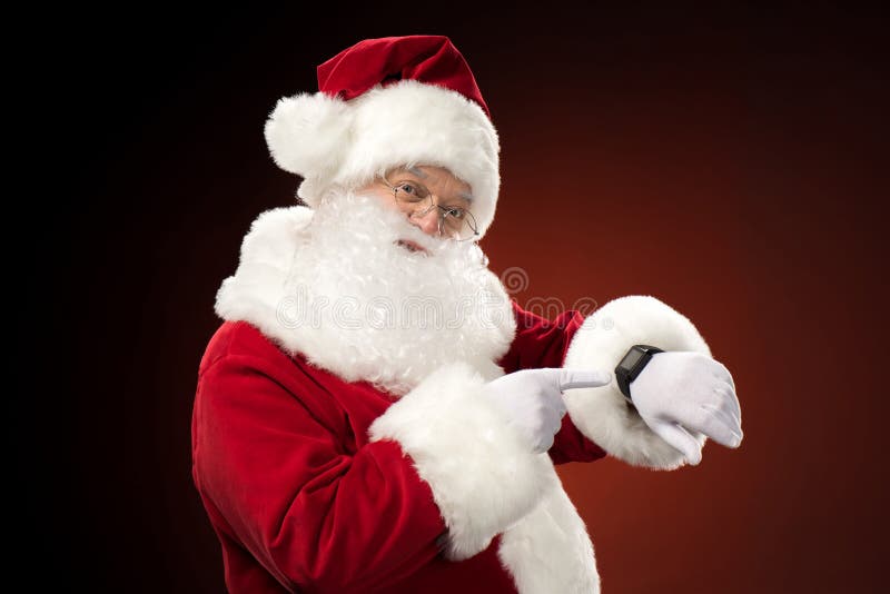Santa Claus Pointing on Smart-watch Stock Image - Image of presents ...