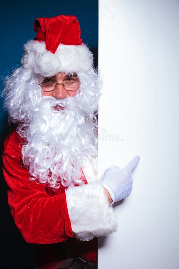 Santa Claus Pointing To a Blank Board Stock Photo - Image of glasses ...