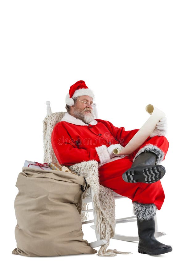Santa Claus Reading a Christmas Wish List on Scroll Stock Photo - Image ...