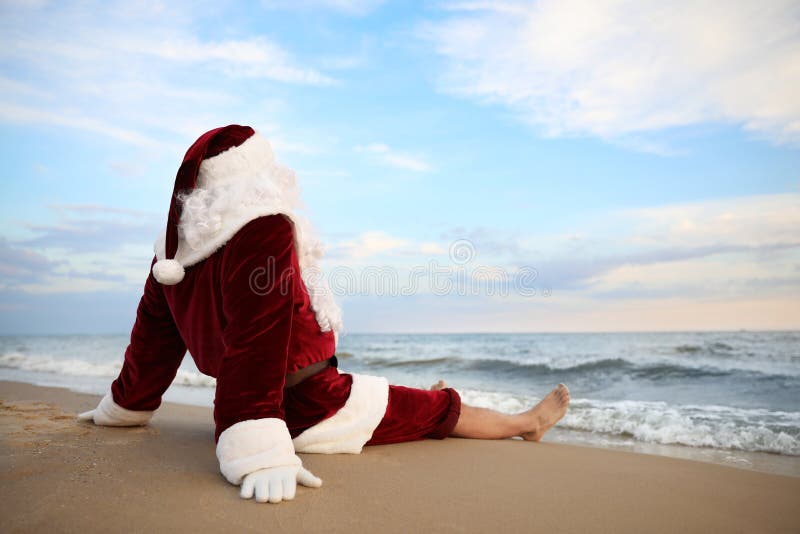 Santa Claus Relaxing on Beach, Space for Text. Christmas Vacation Stock ...