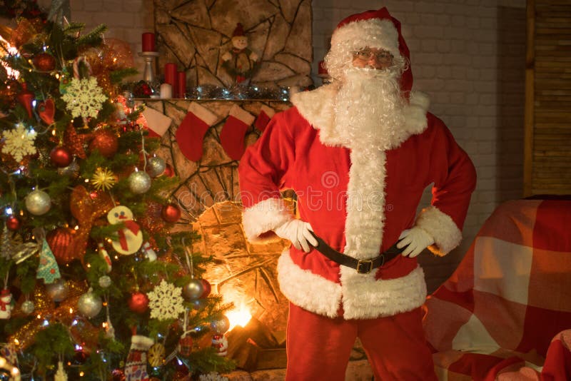 Santa Claus in a room stock image. Image of gifts, presents - 130253971