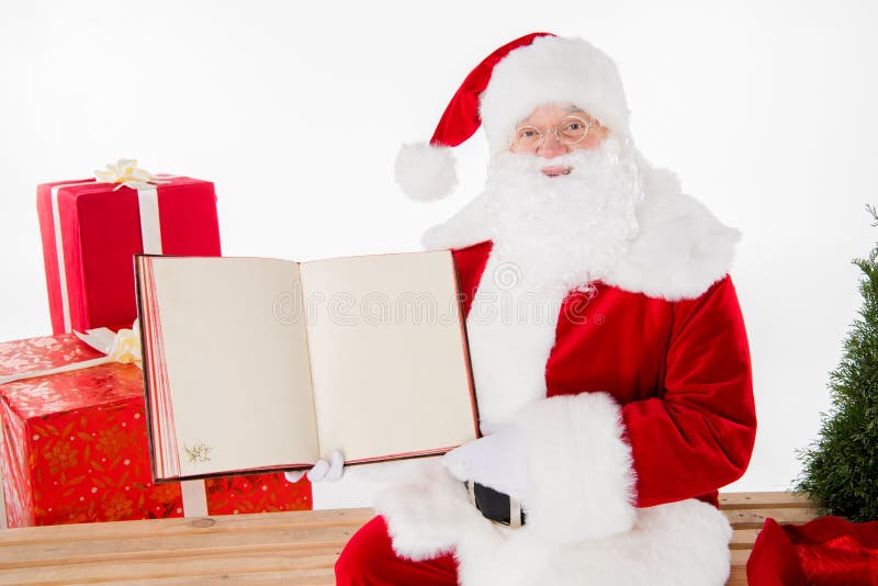 Santa Claus showing book stock image. Image of holidays - 88129187